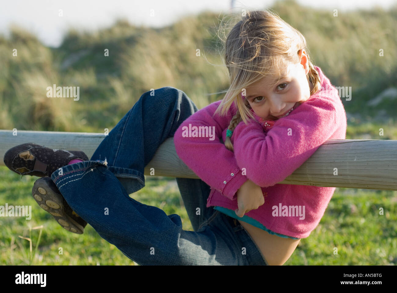 girl playing outdoors Stock Photo - Alamy