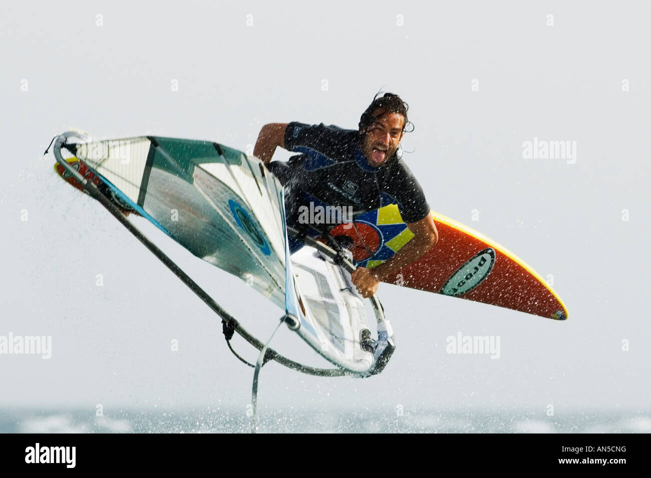 windsurfer doing a killer loop Stock Photo - Alamy