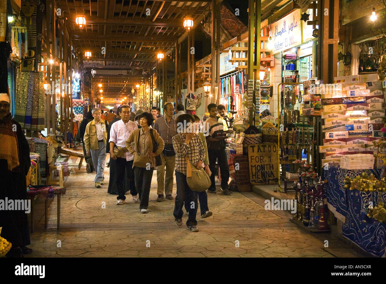 Shopping in The Souk at night in Luxor Egypt Stock Photo - Alamy