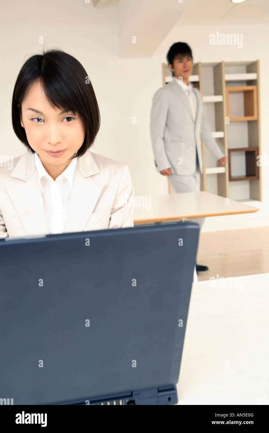 Office lady operating a PC Stock Photo - Alamy