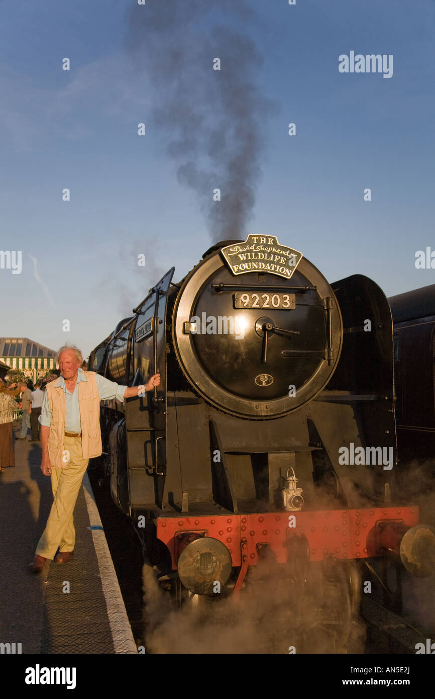 Artist and conservationist David Shepherd poses with his steam train ...