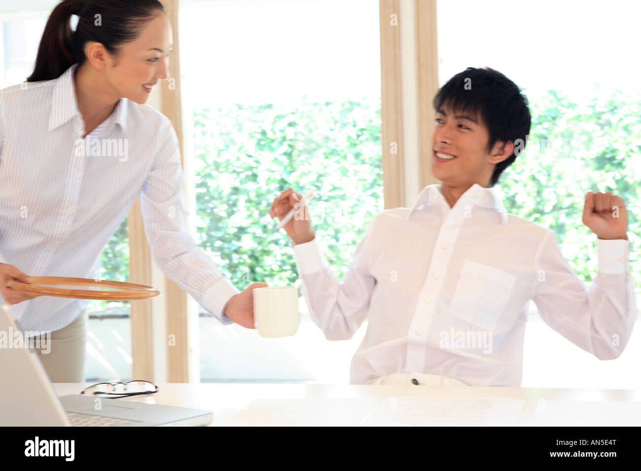 Office workers taking a rest Stock Photo - Alamy