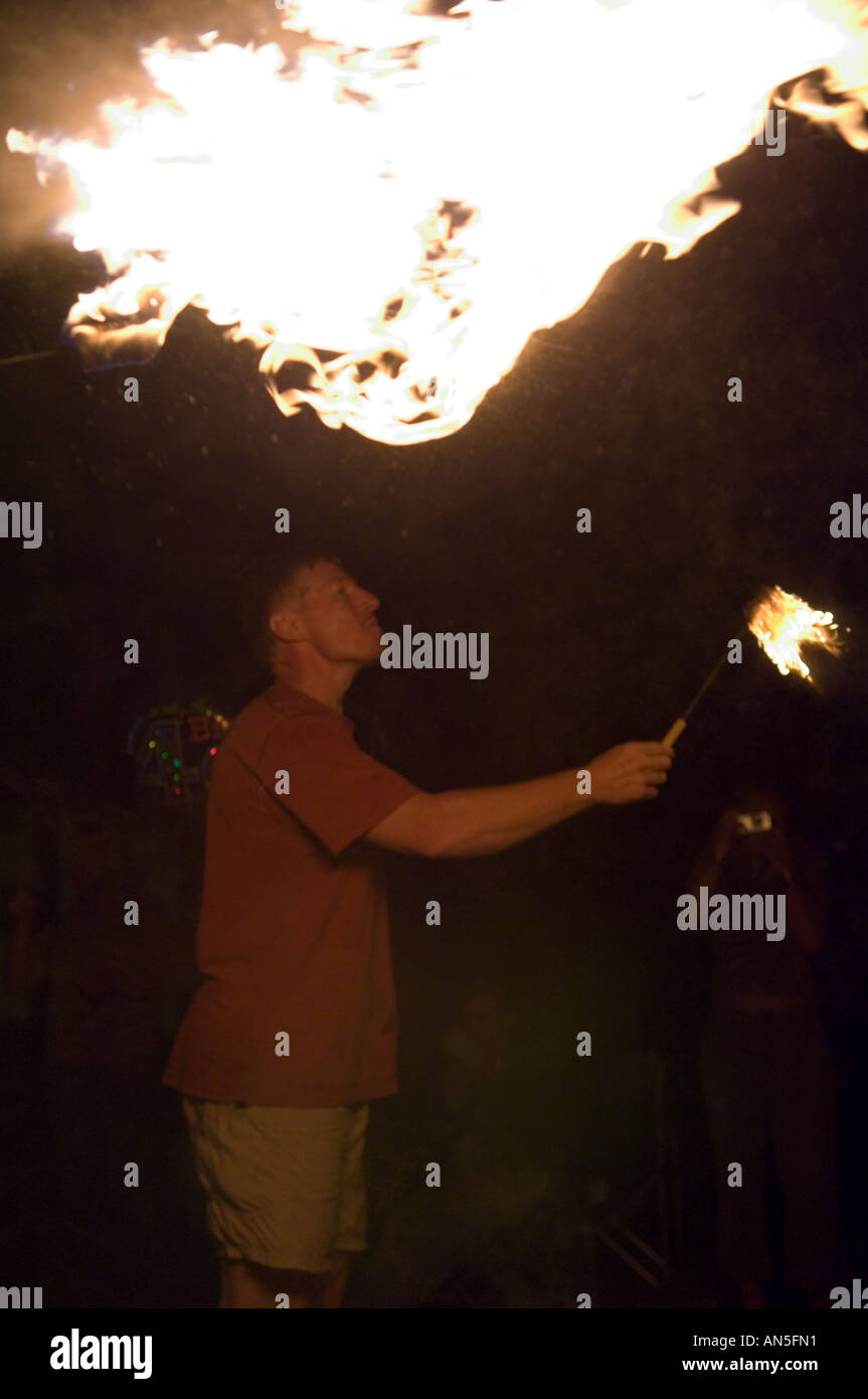 A friend of the photographer demonstrates his fire eating skills Stock ...