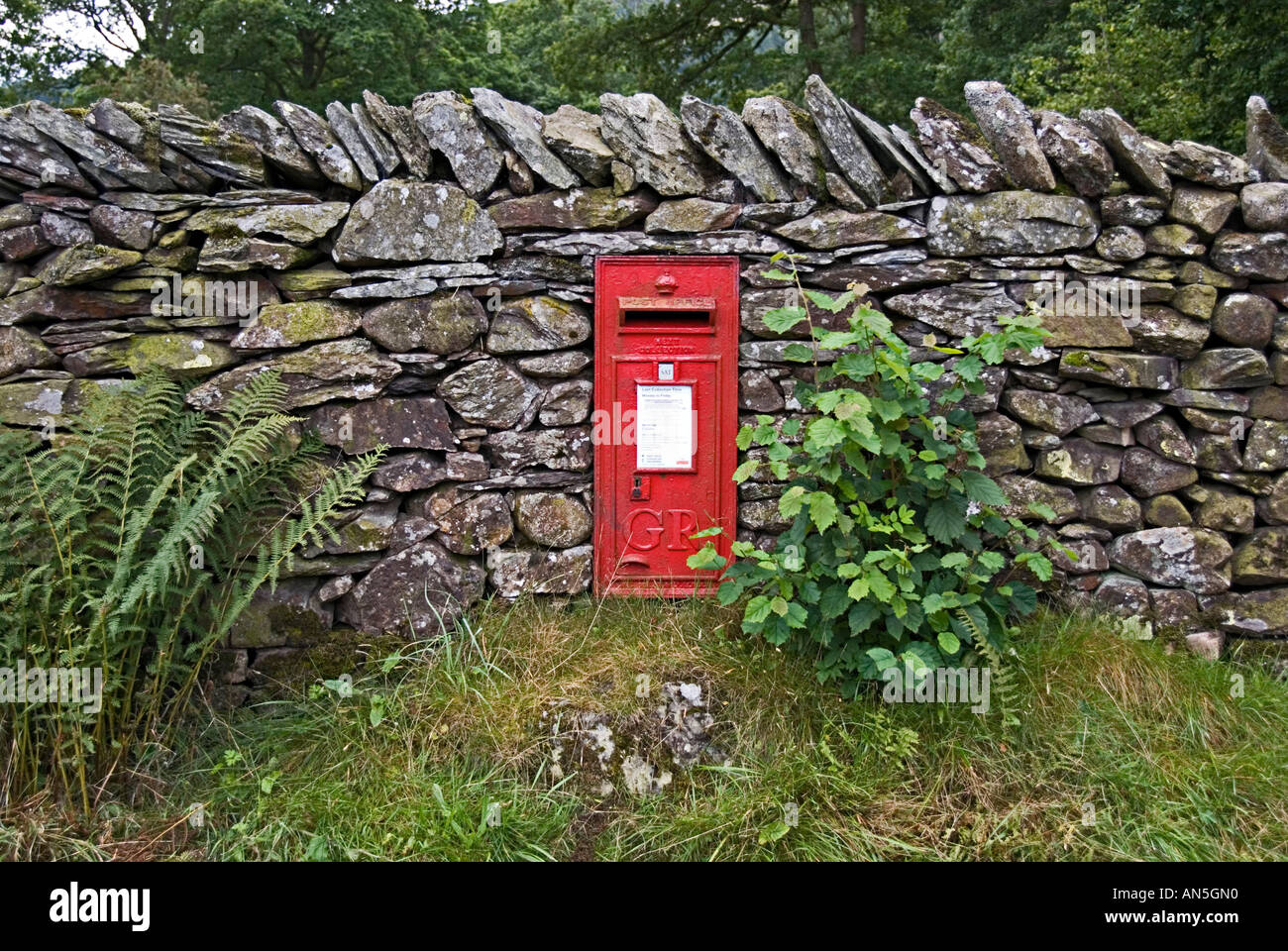 Royal Mail collection box set in a drystone wall Stock Photo - Alamy