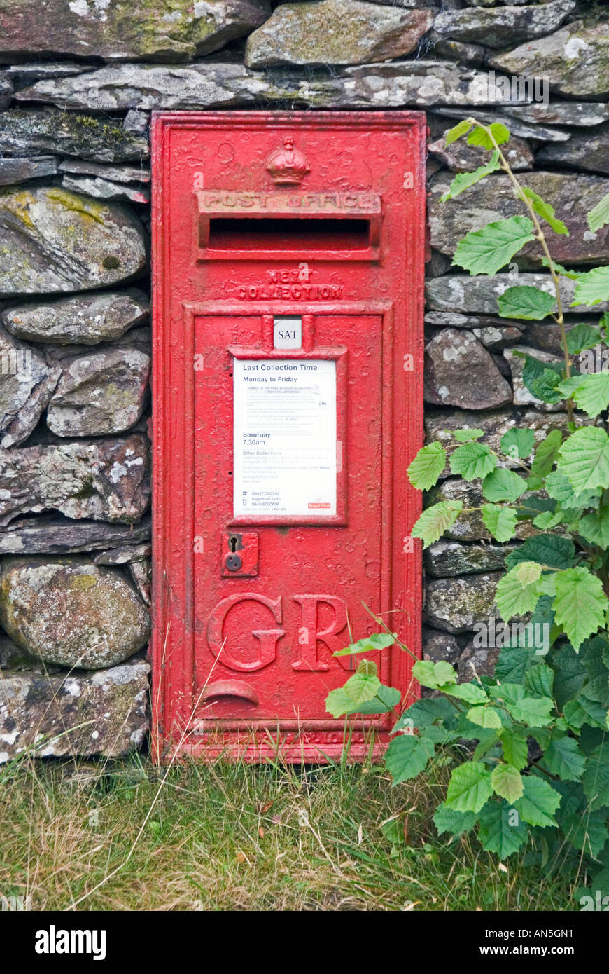 Royal Mail collection box set in a drystone wall Stock Photo - Alamy