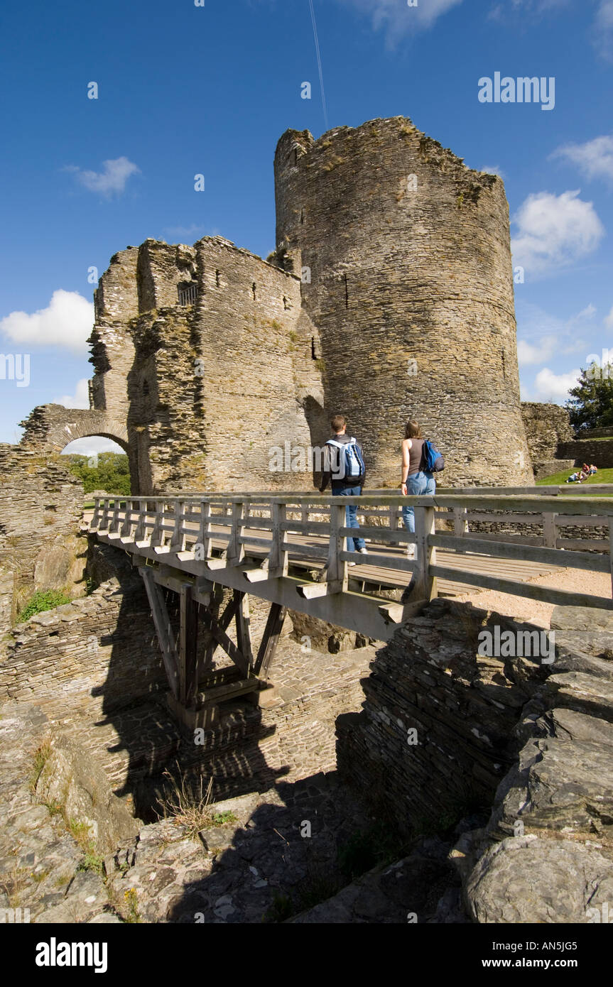 Two young people visiting the ruins of Cilgerran Castle pembrokeshire ...