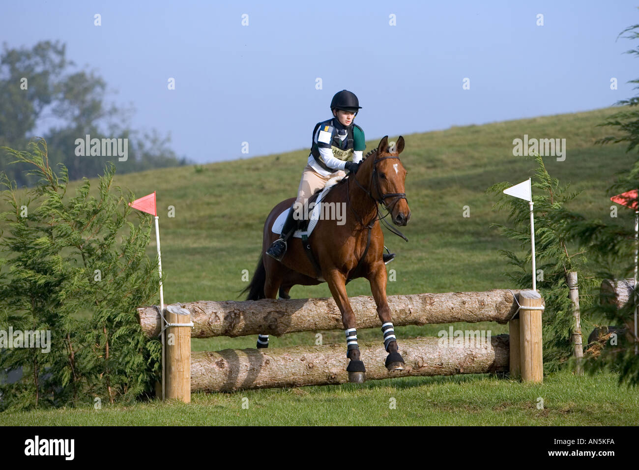 Event riding competing in cross country phase of competition ...