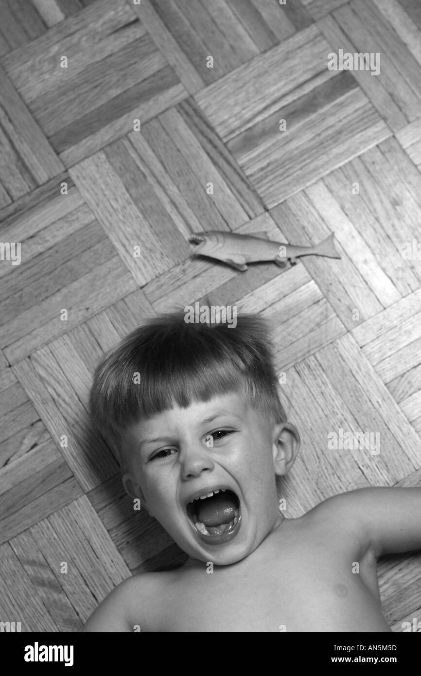 Child being silly laughing Stock Photo - Alamy