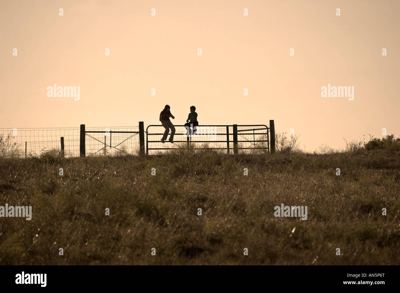 Two children fence country hi-res stock photography and images - Alamy