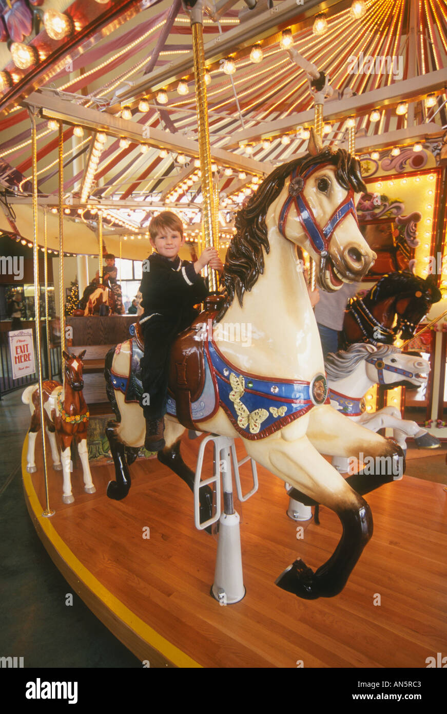 Five year old boy on carousel at Riverfront Park Salem Oregon Stock ...