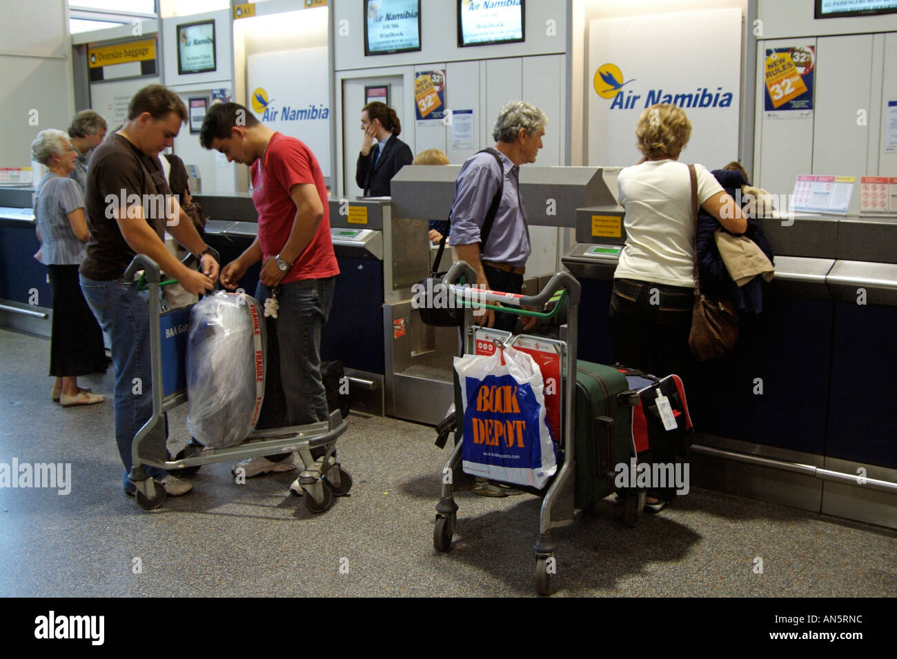 Check in desks at Gatwick Airport London England UK Stock Photo - Alamy