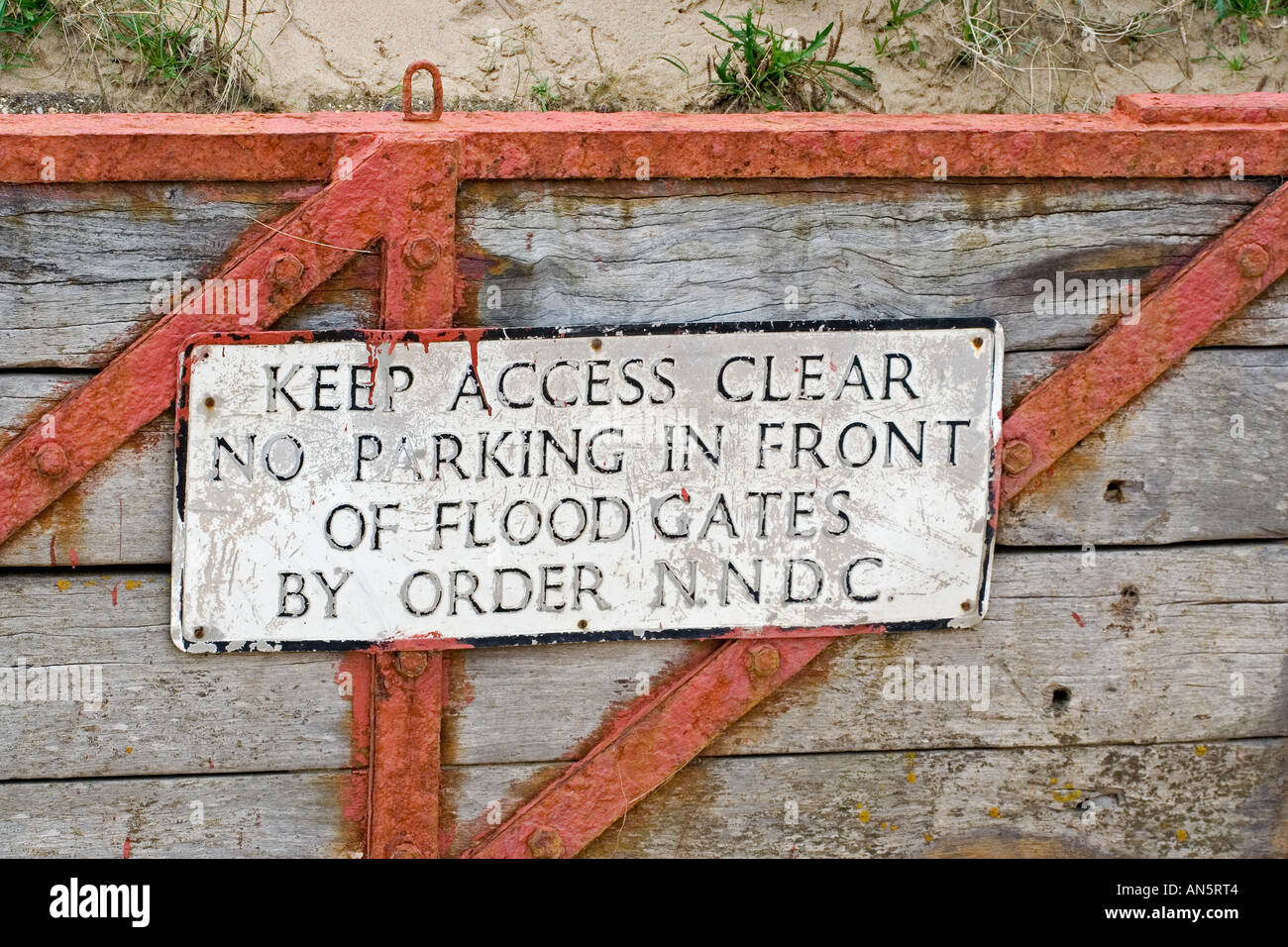 sea defence sign Stock Photo - Alamy