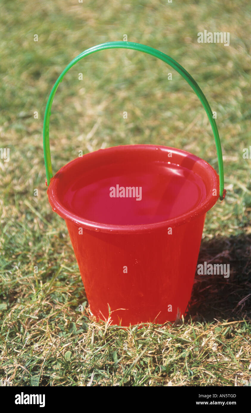 Bucket of water Stock Photo - Alamy