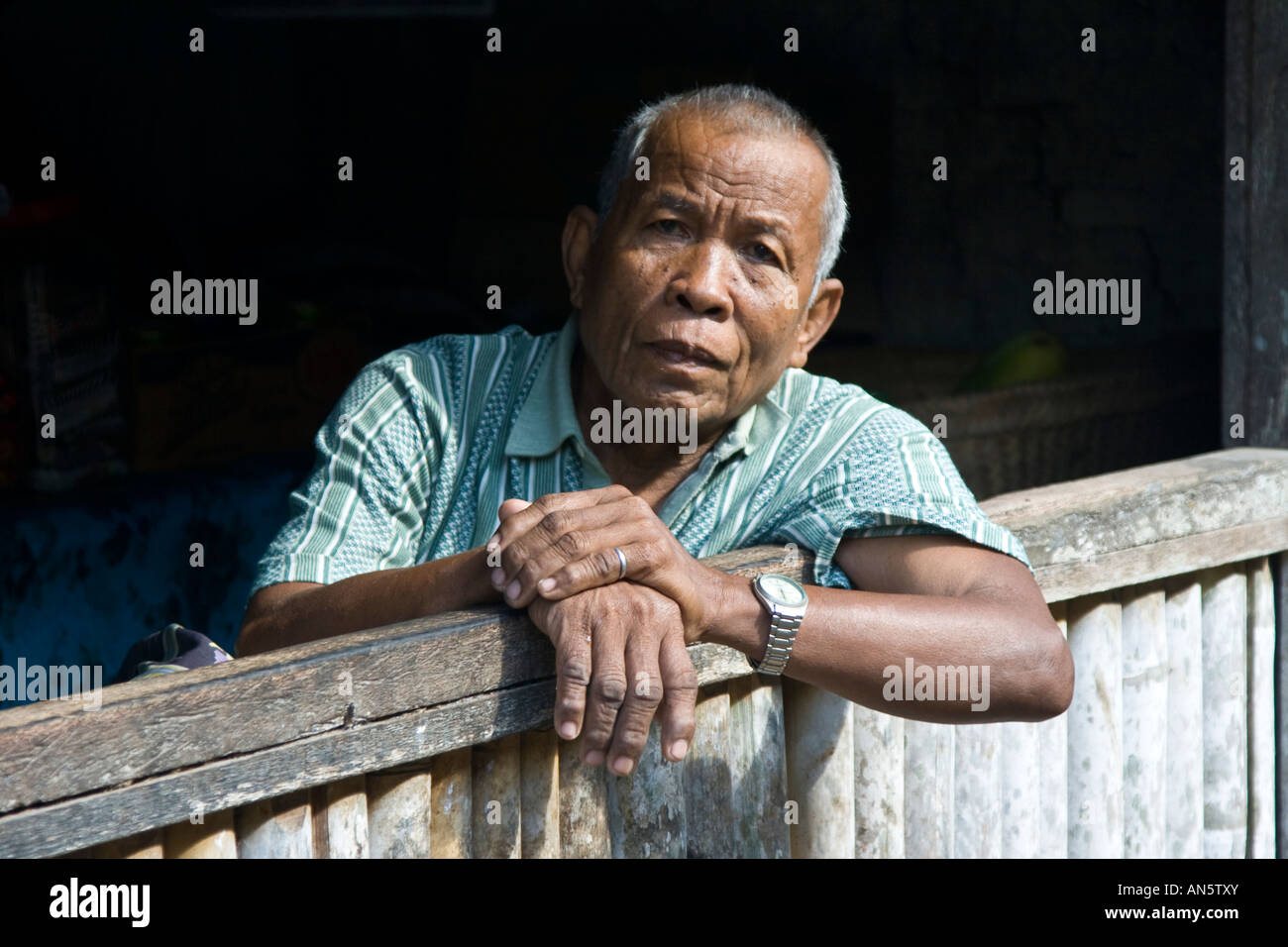Elderly Balinese Man in a Window Tenganan Aga Village Bali Indonesia ...