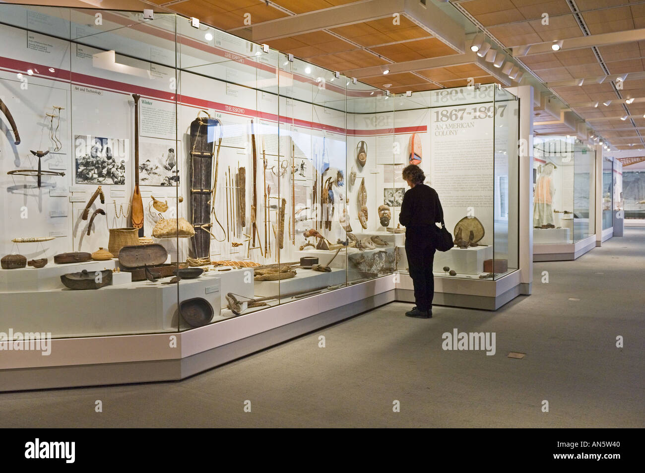 Anchorage Museum of Art and History woman visitor at Eskimo exhibit ...
