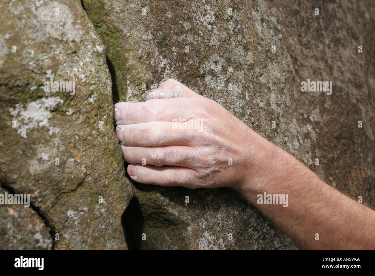 Hand gripping rock hi-res stock photography and images - Alamy