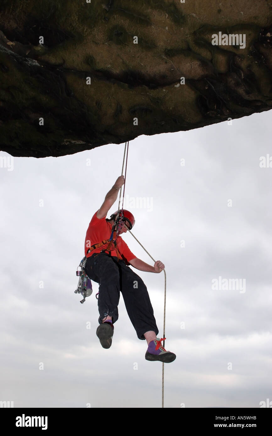 Rock Climber Abseiling Free of the Rock Below an Overhang Stock Photo ...