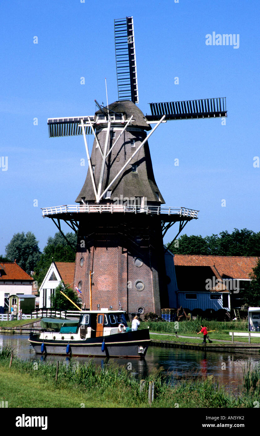 Netherlands Holland Historic Village windmill Stock Photo - Alamy