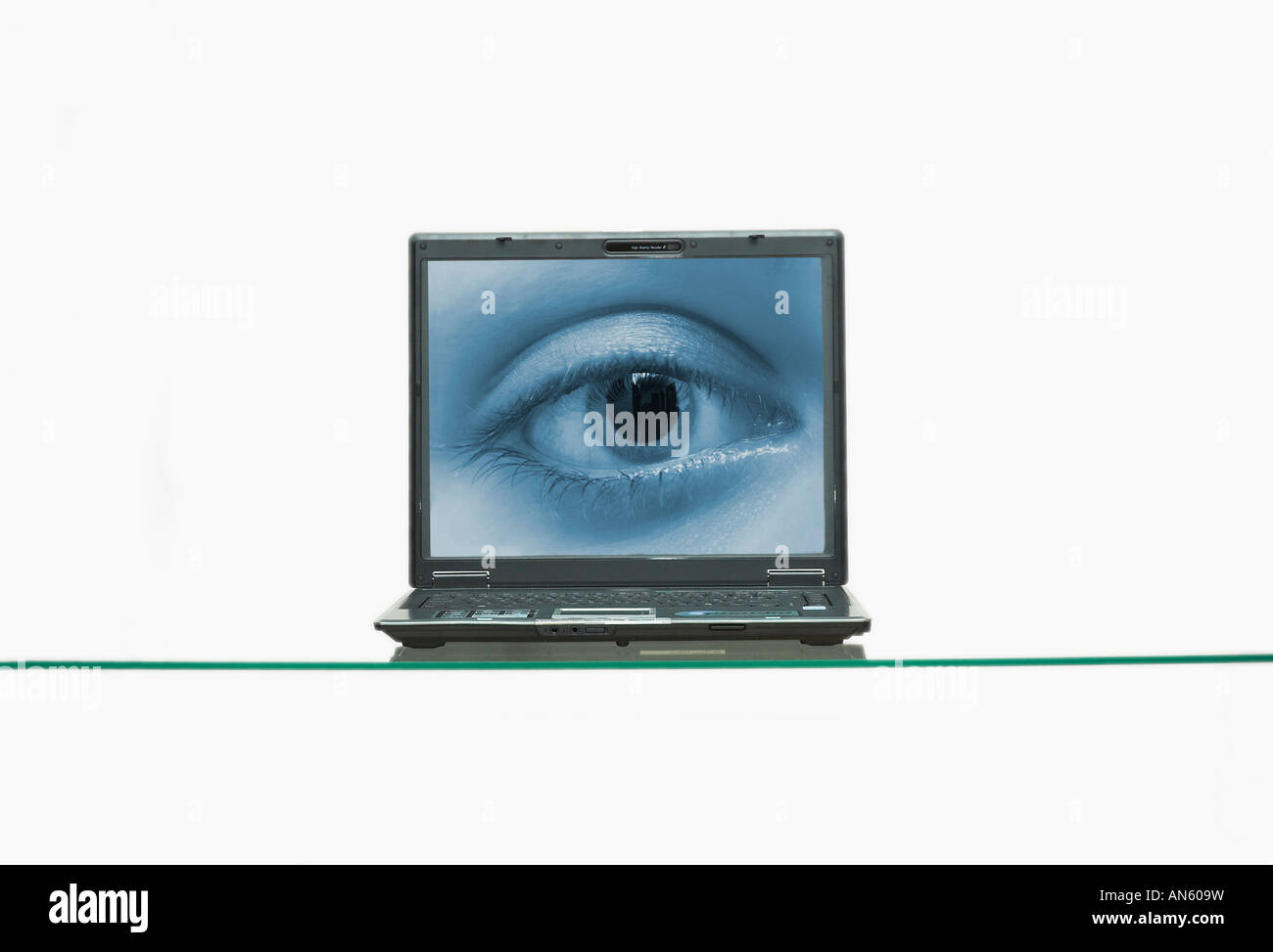 Human eye on laptop monitor digital composite Stock Photo - Alamy