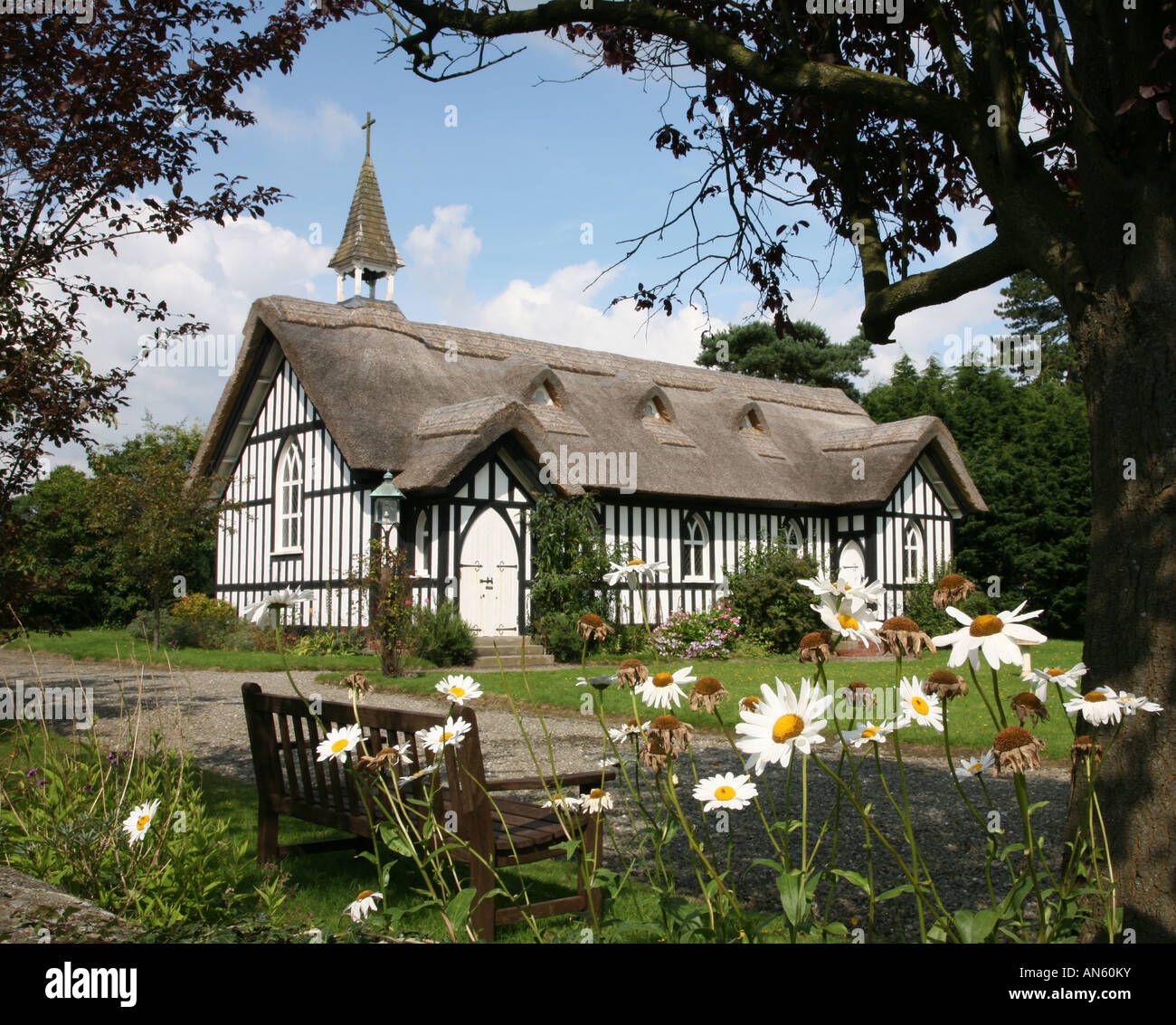 The picturesque thatched All Saints Church at Little Stretton ...