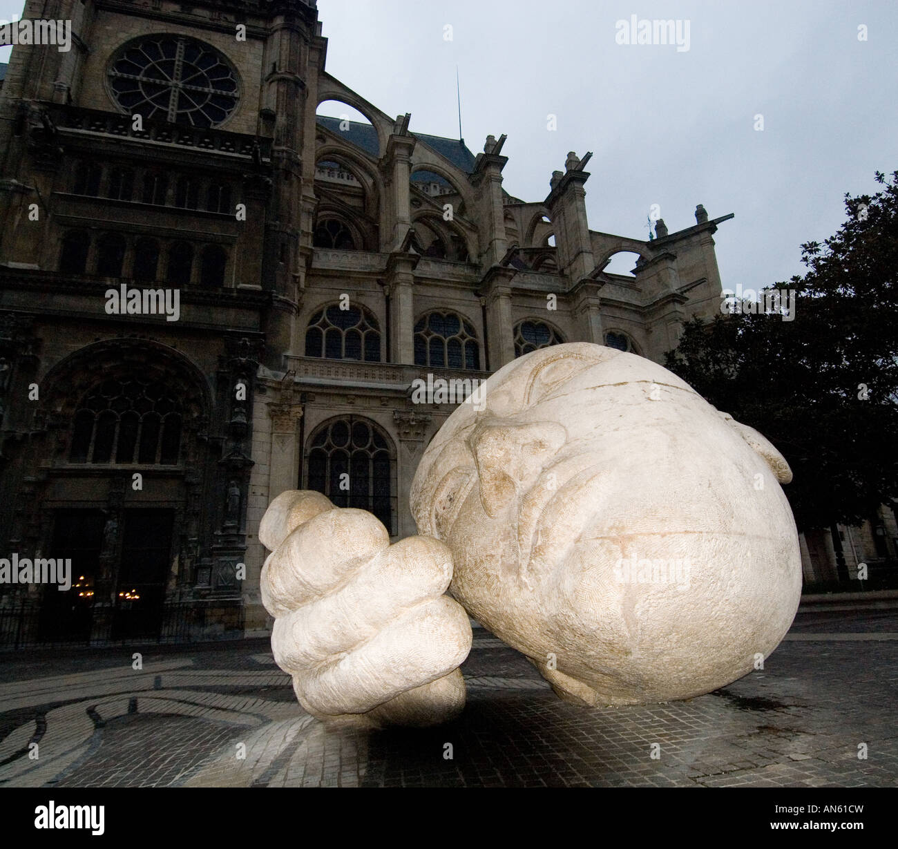 Statue outside St Eustache in Las Halles Paris France Stock Photo - Alamy