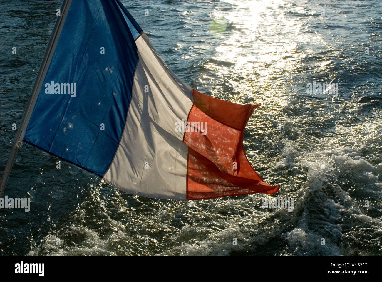 French flag from back of a boat on the river Seine Paris France Stock ...
