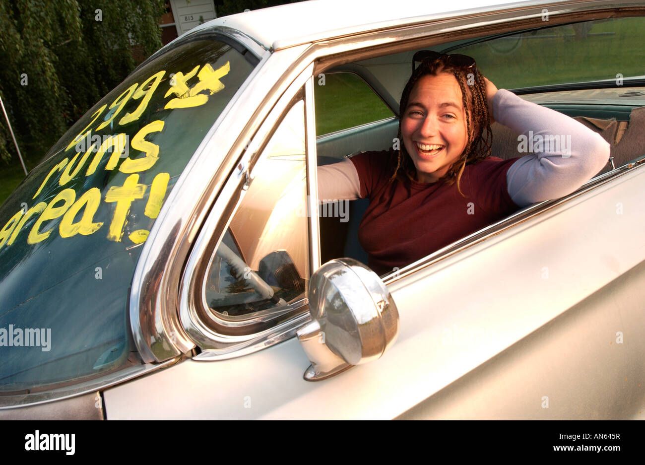 Girl test driving car Stock Photo - Alamy