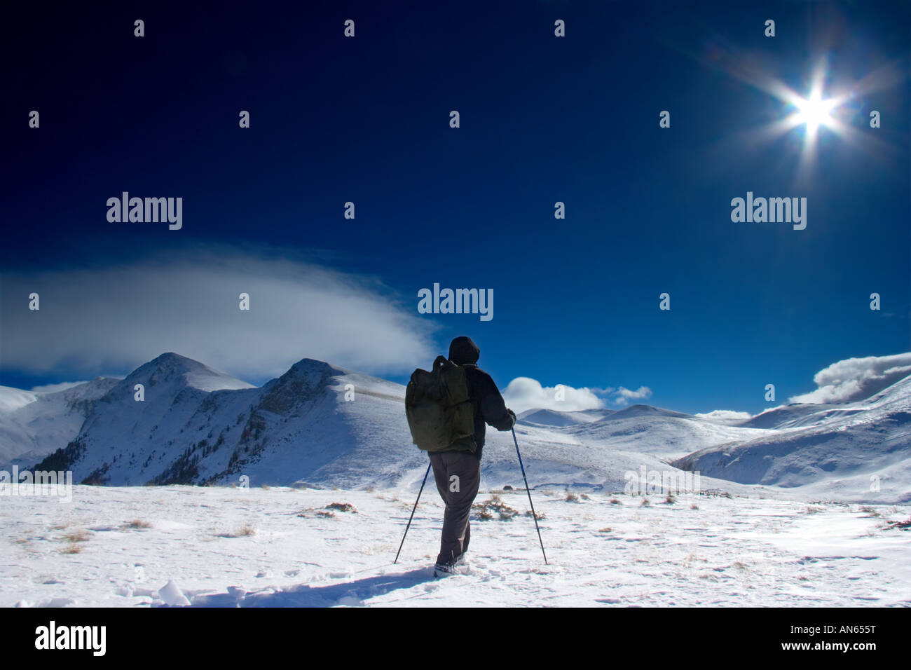 Climber going to the top of the mountain Stock Photo - Alamy