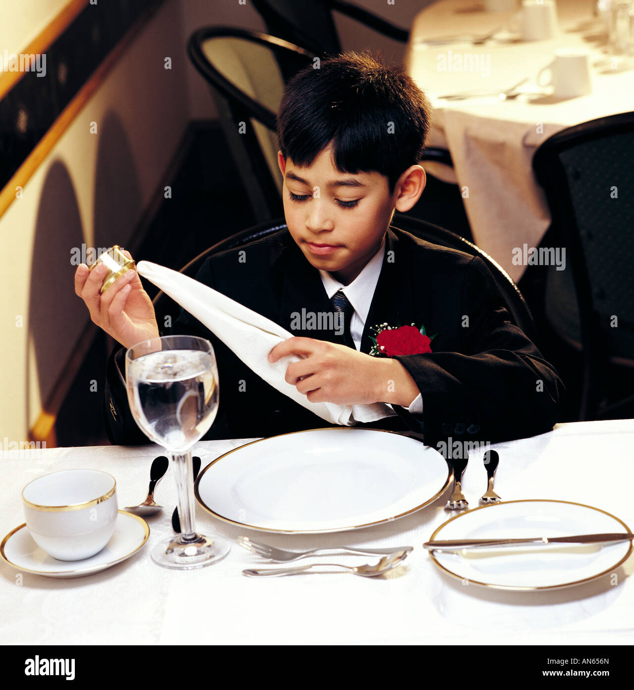 A boy at a wedding reception Stock Photo - Alamy