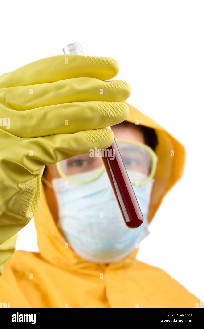 Scientist conducting a test using a test tube Stock Photo - Alamy