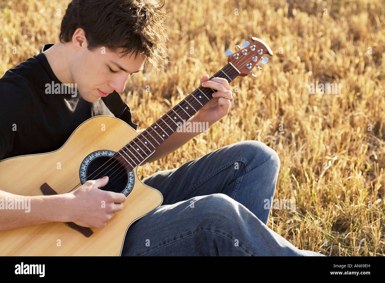 Man playing guitar Stock Photo - Alamy