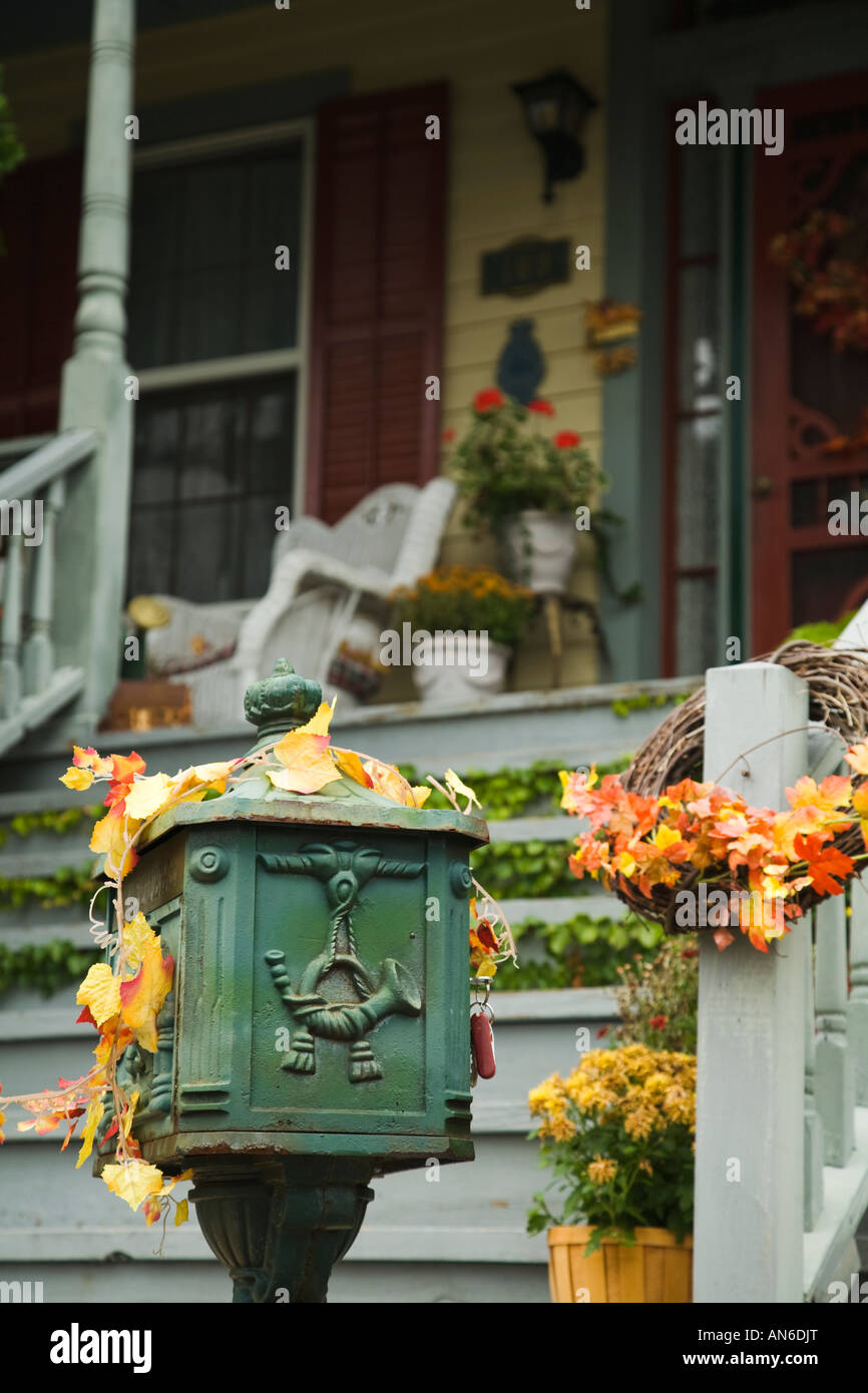 ILLINOIS Galena Front porch with fall decorations leaves chrysanthemums ...