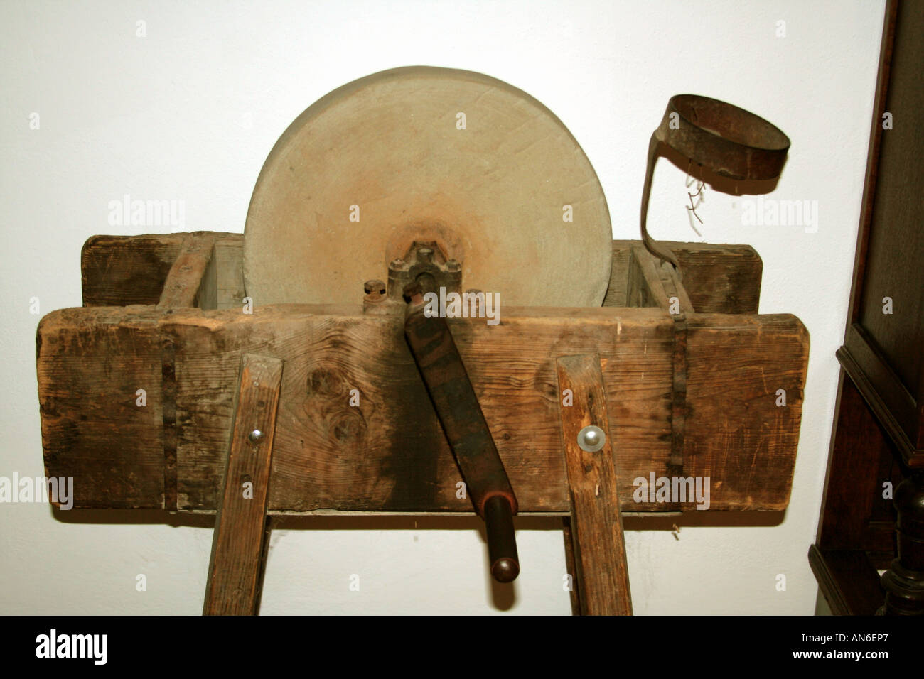 old grinding stone Stock Photo - Alamy
