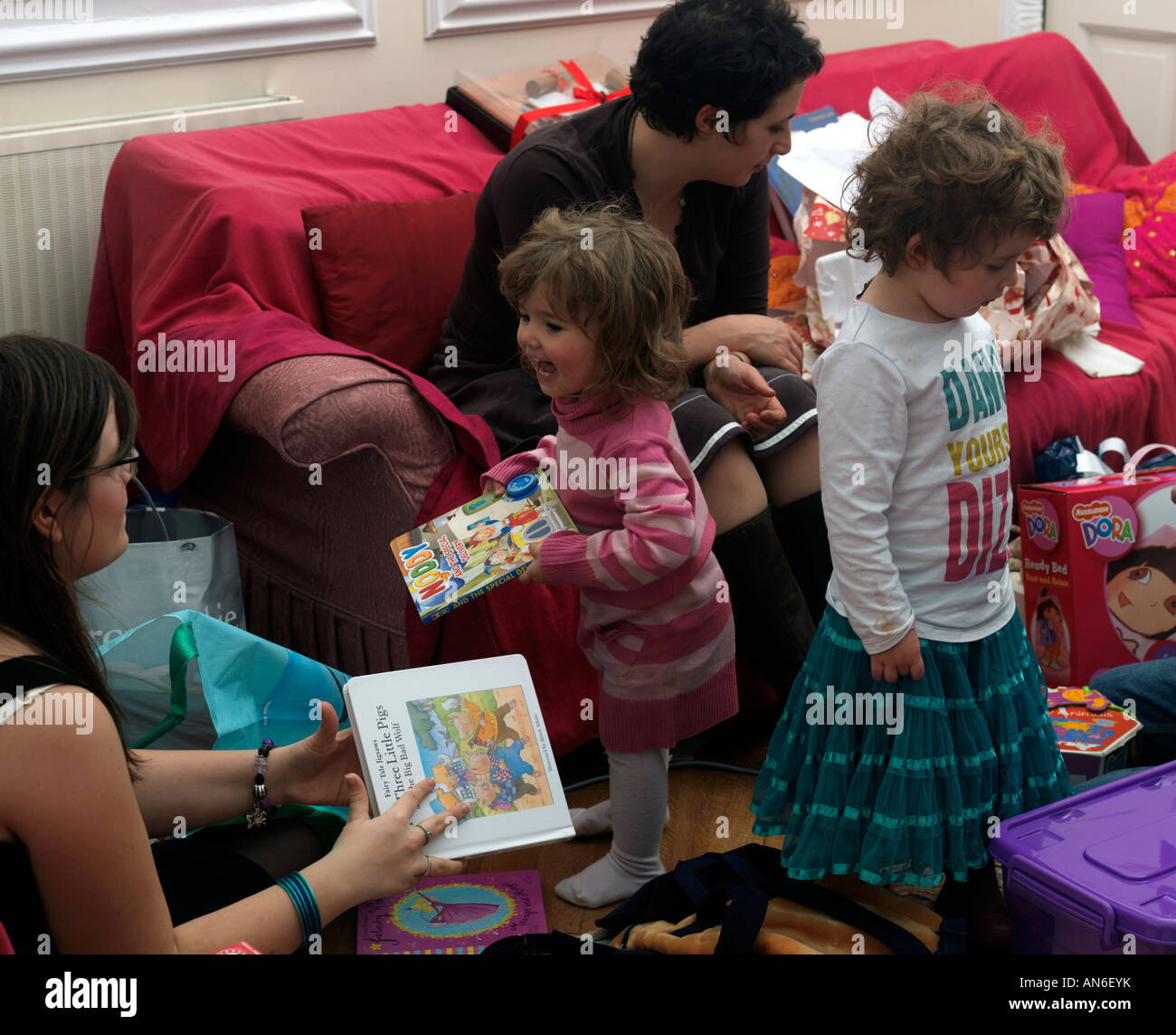 Christmas children presents morning hi-res stock photography and images ...