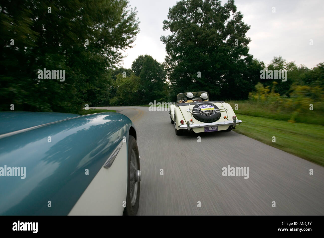 Sports car overtaking classic car hi-res stock photography and images ...