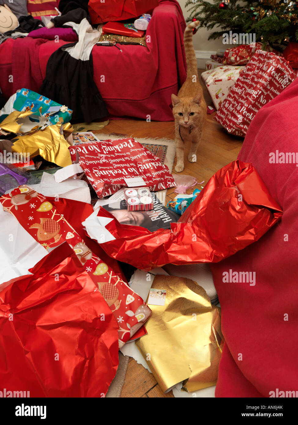 Mess christmas presents wrapping paper hi-res stock photography and ...