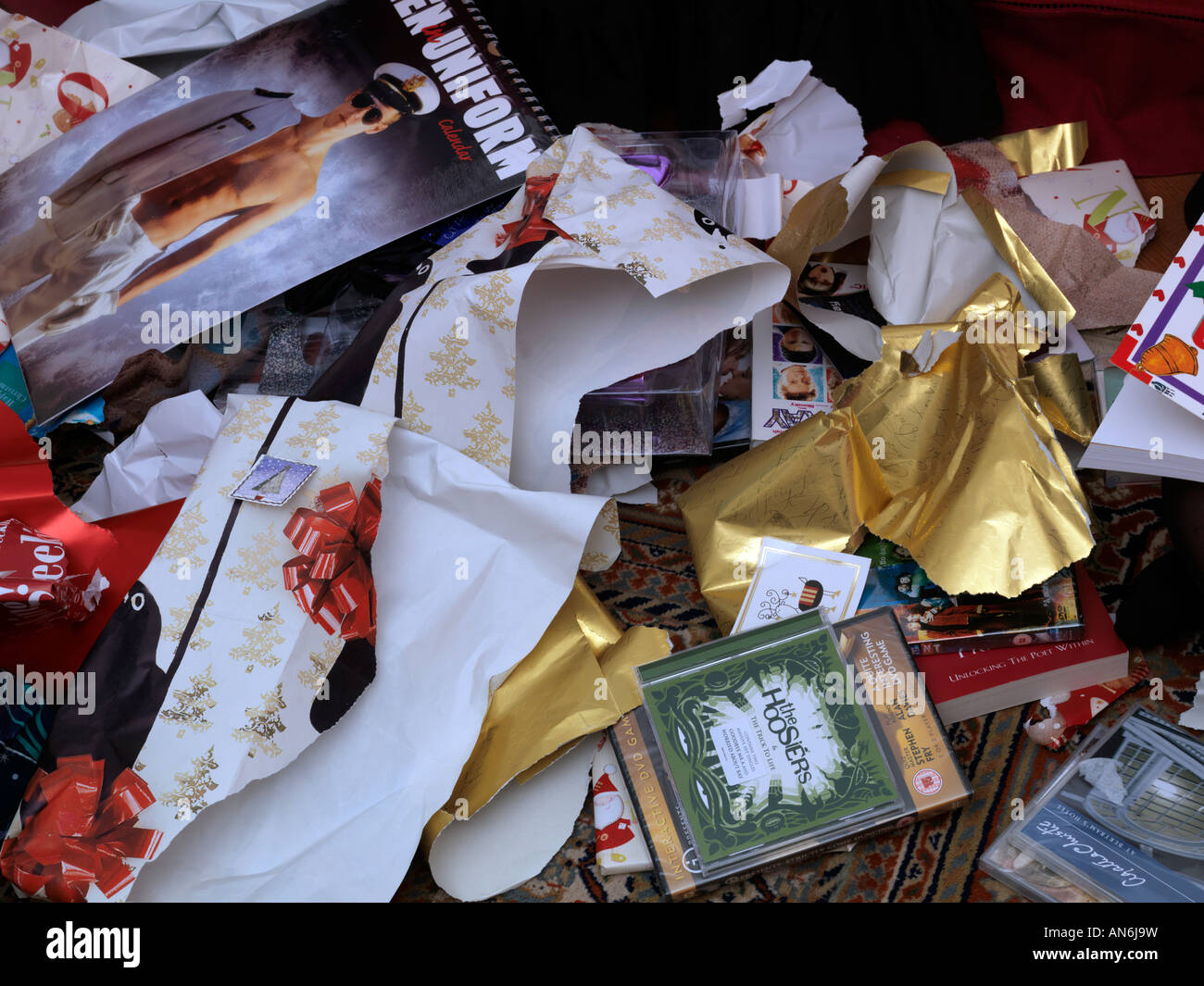 Mess christmas presents wrapping paper hi-res stock photography and ...