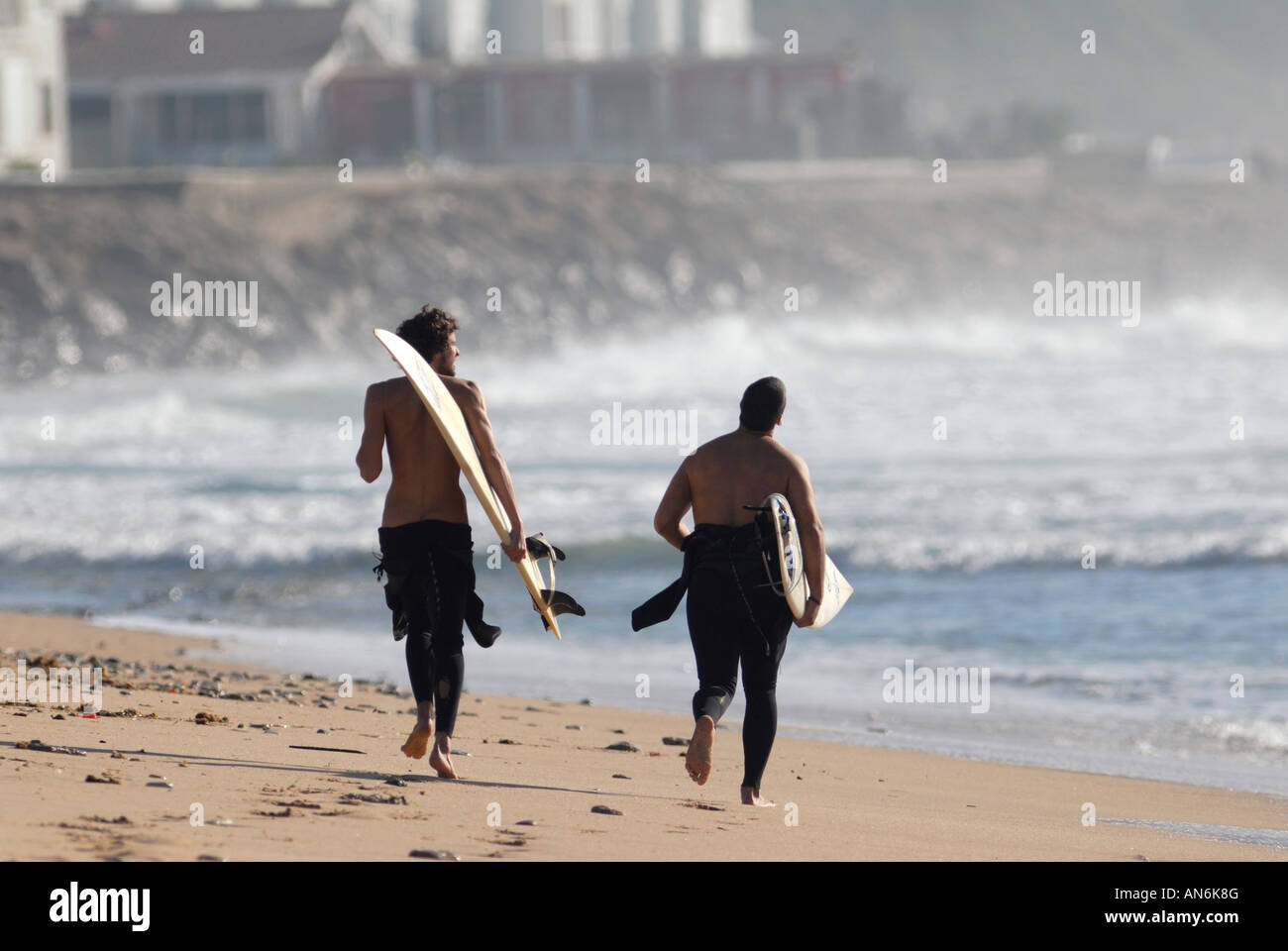 Walking surfers hi-res stock photography and images - Alamy