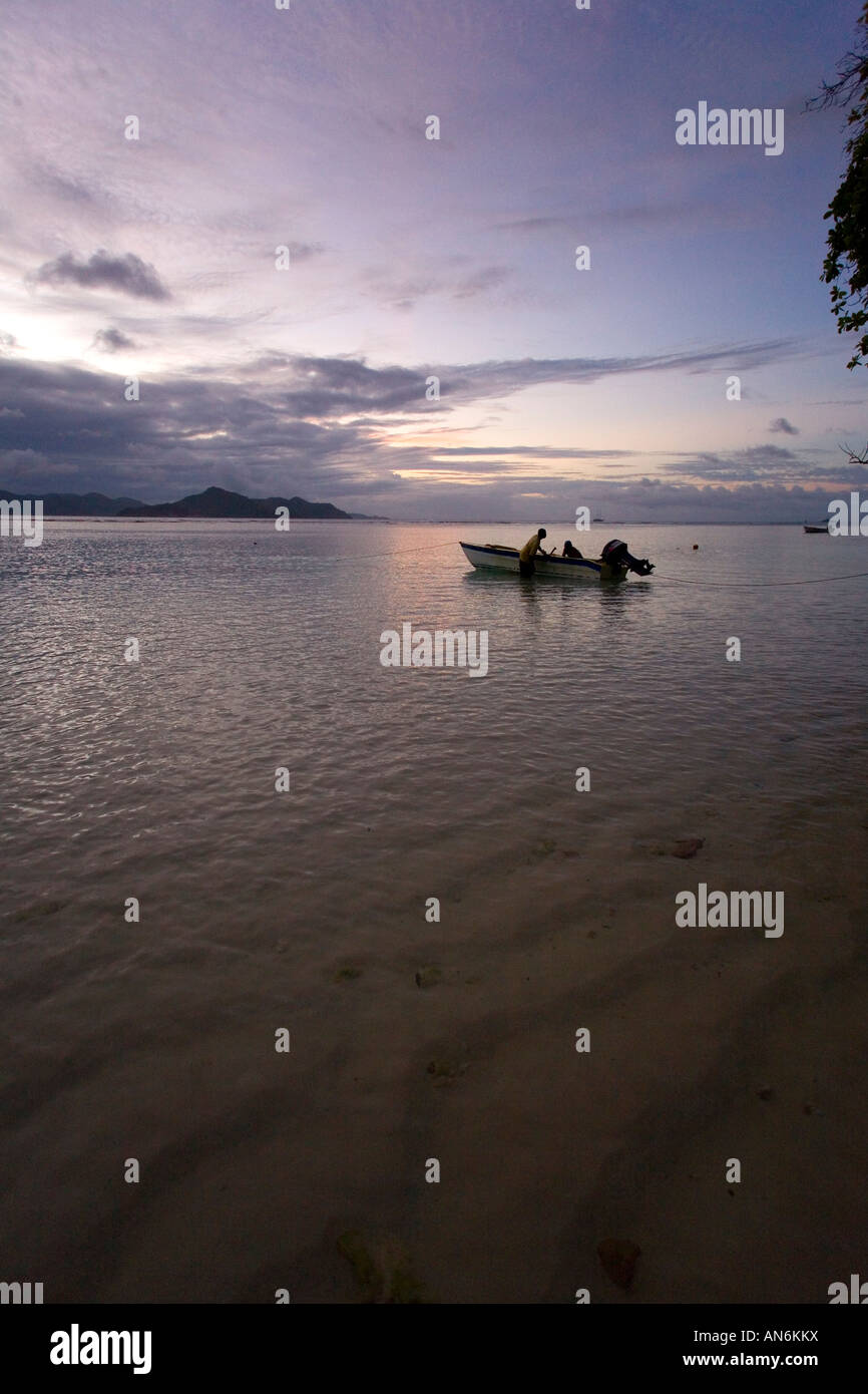 Fishermen on the island of La Digue Seychelles Stock Photo - Alamy