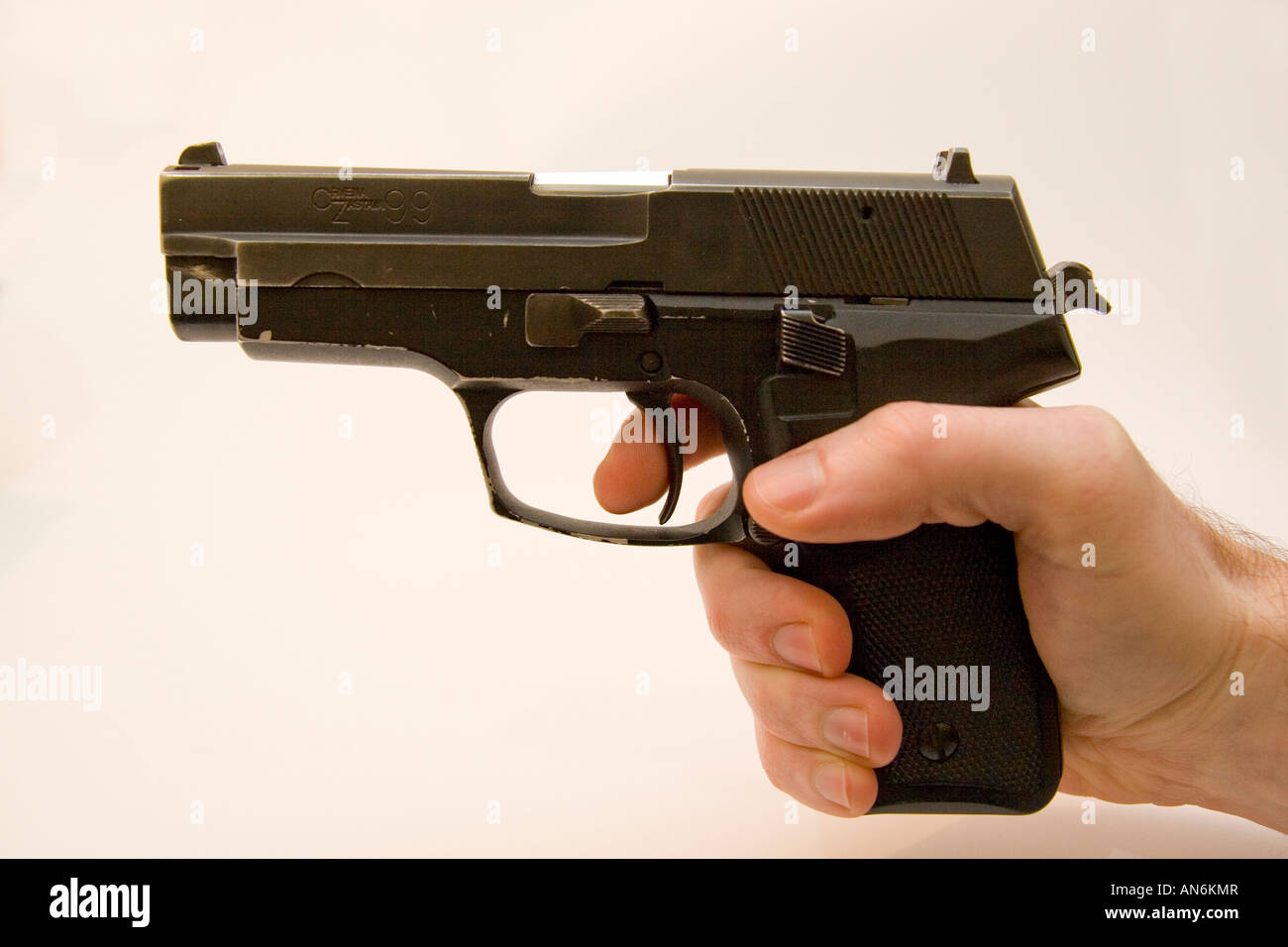 Man finger on trigger gun hi-res stock photography and images - Alamy