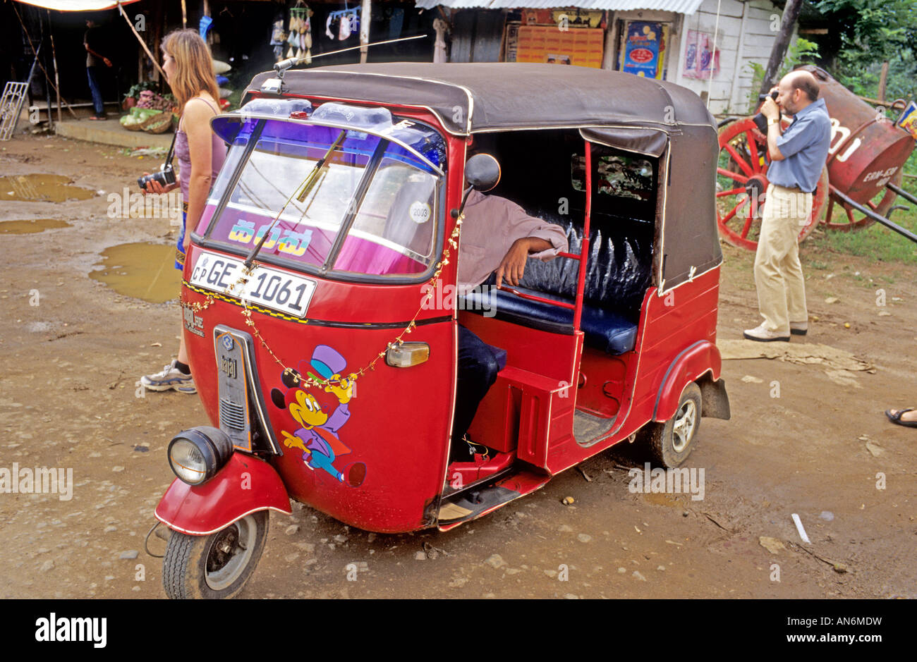 Three wheeled taxi in Pussellawa Sri Lanka waiting for hire Stock Photo ...