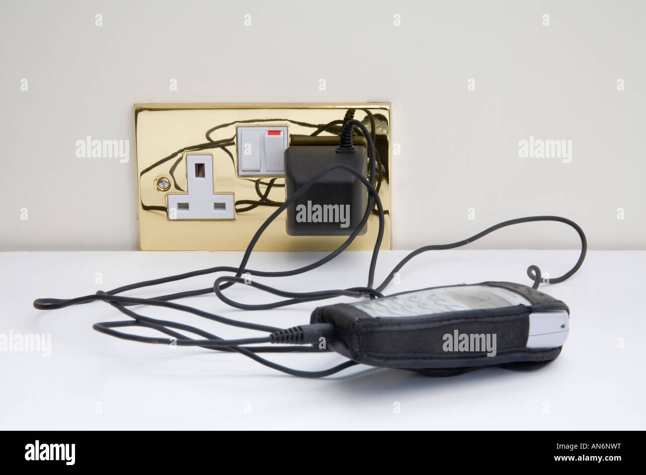 Phone plugged into socket hi-res stock photography and images - Alamy