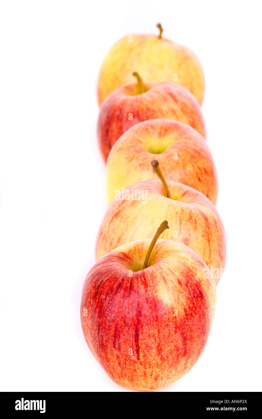 Apples in a row Stock Photo - Alamy
