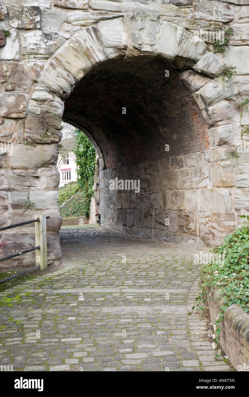 Arch for footpath under the Iron Bridge at Ironbridge, UK Stock Photo ...