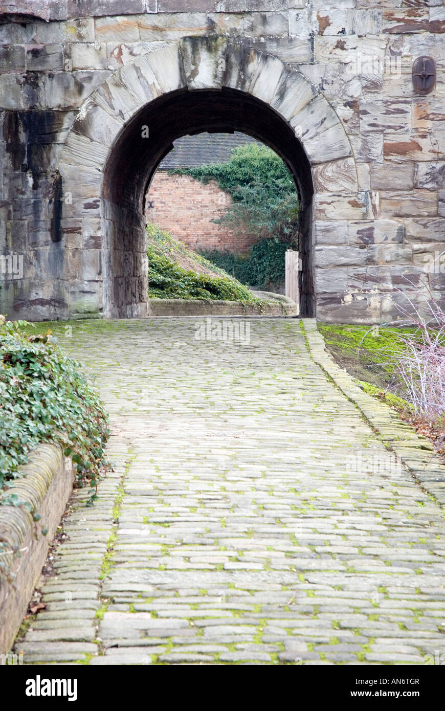 Arch for footpath under the Iron Bridge at Ironbridge, UK Stock Photo ...
