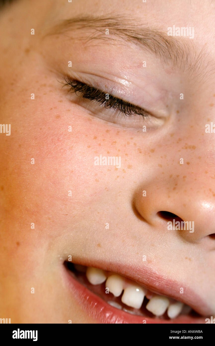 young boy kid smiling close up happy elated over the moon cheeky ...