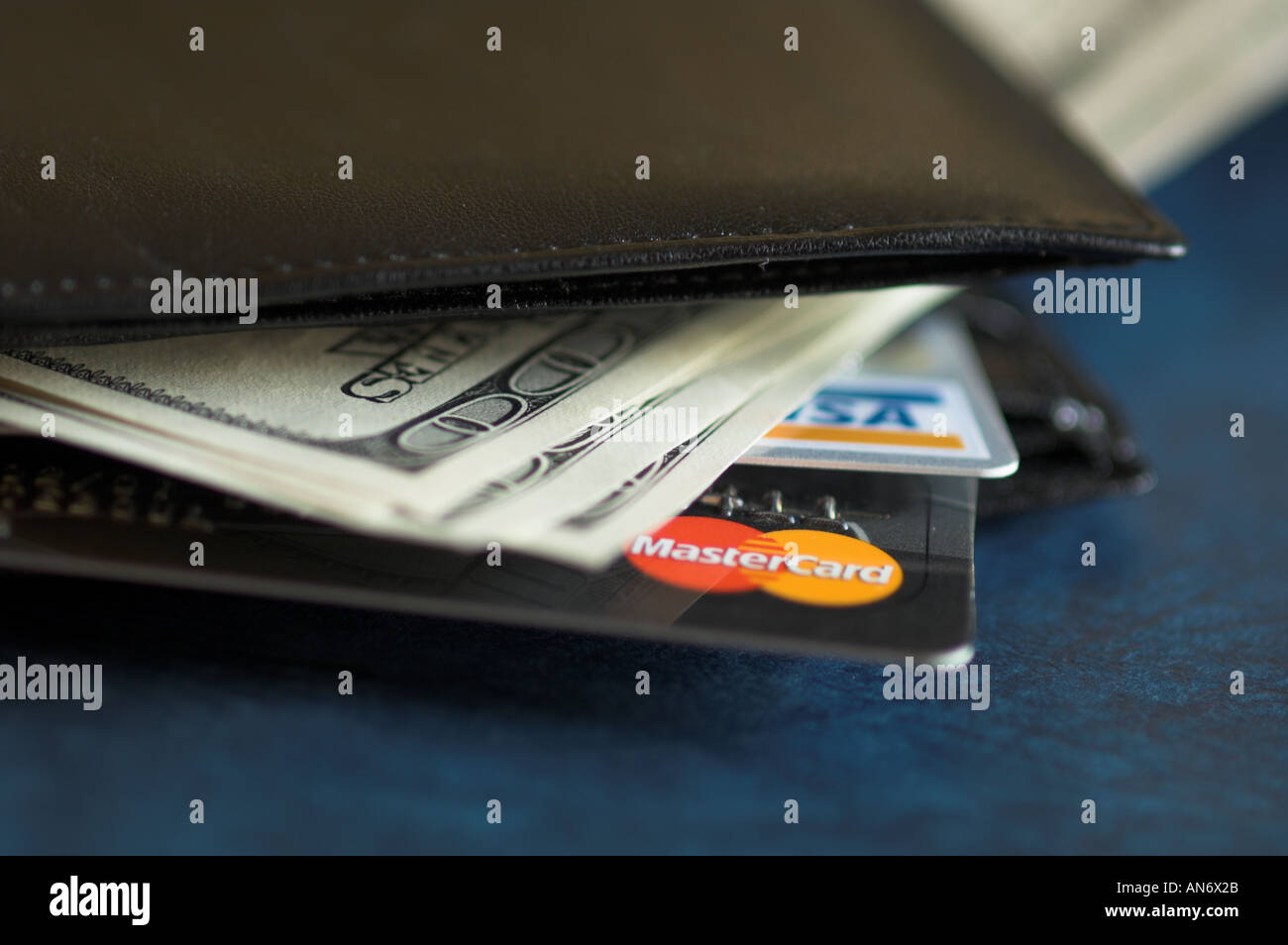 credit card coming out of a wallet Stock Photo - Alamy