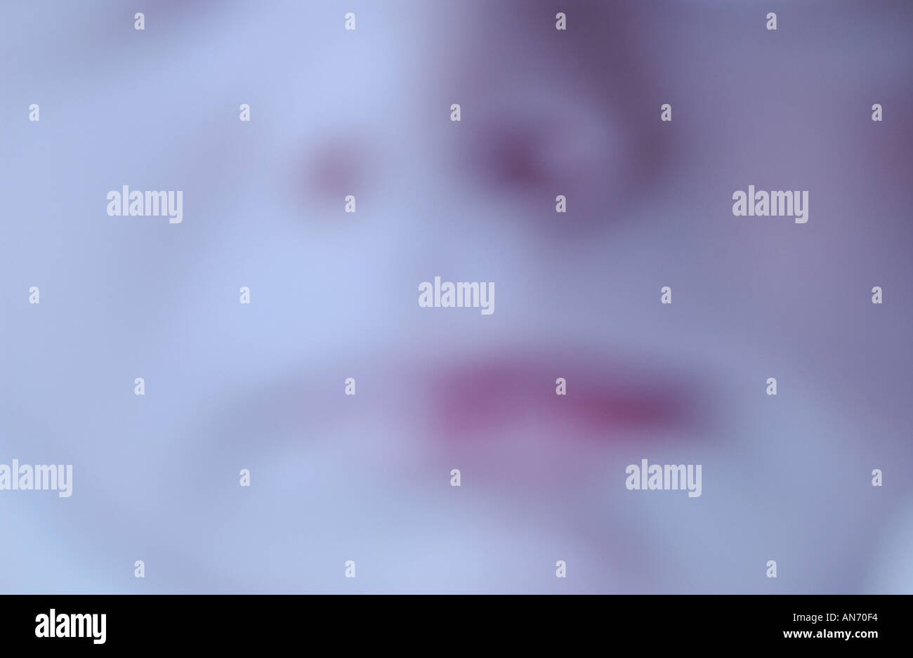 A childs face out of focus Stock Photo - Alamy