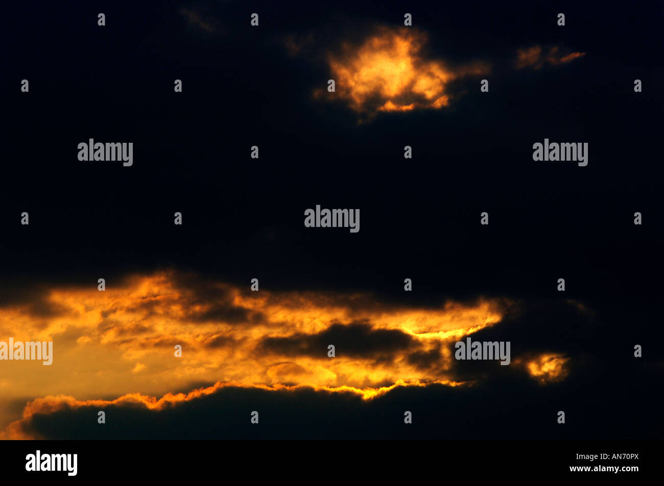 A Red Sky At Night,As The Sun Sets Behind Clouds,Producing The Warm ...