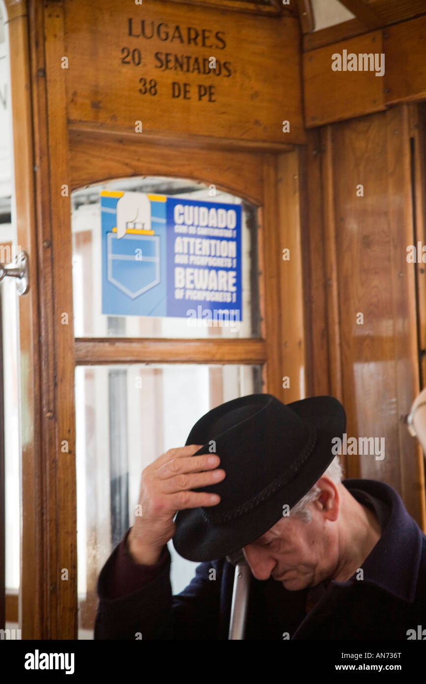Old man with hat inside a tram carriage, Lisbon, Portugal Stock Photo ...